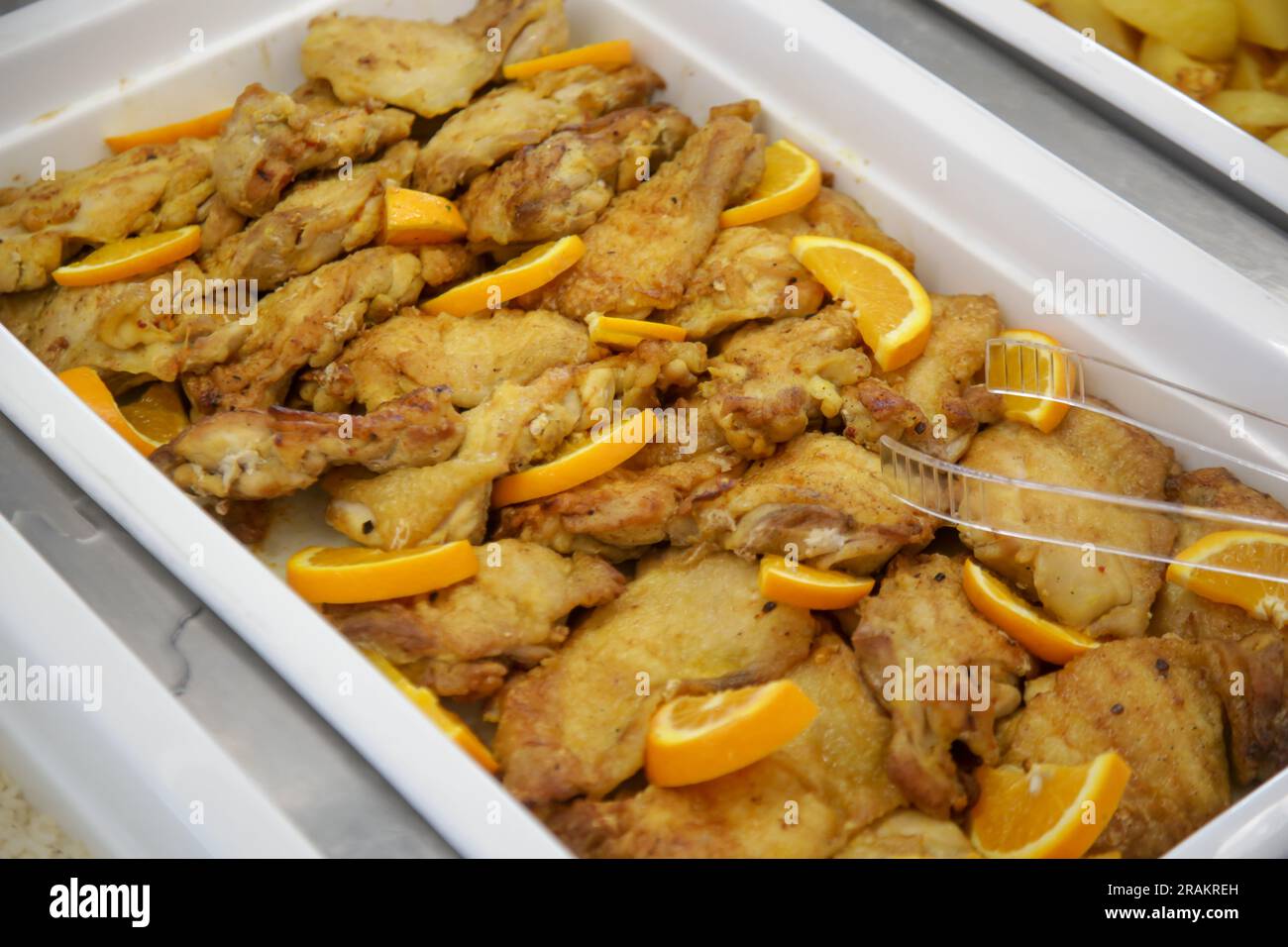 Various food served on a buffet line Stock Photo - Alamy