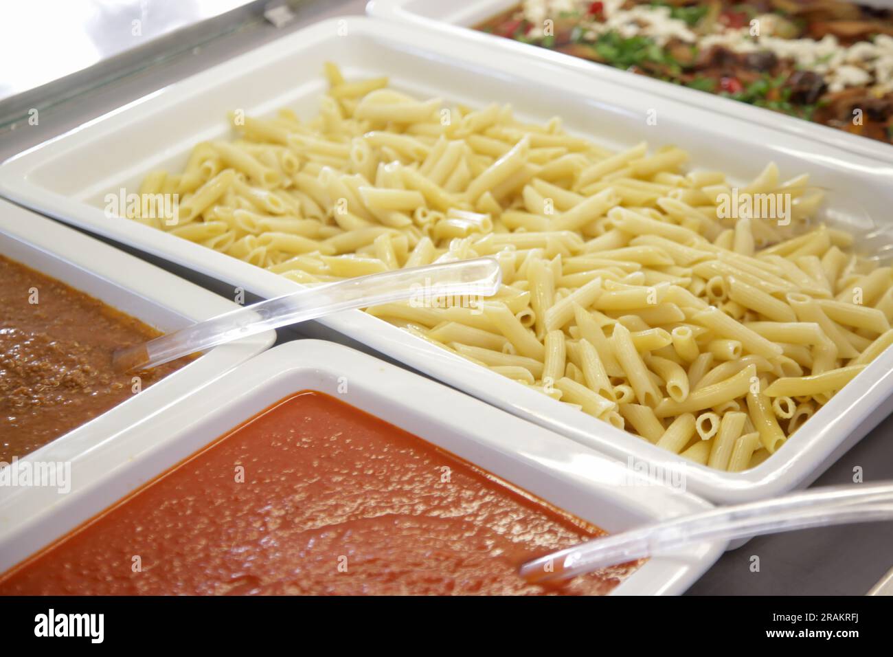 Various food served on a buffet line Stock Photo - Alamy