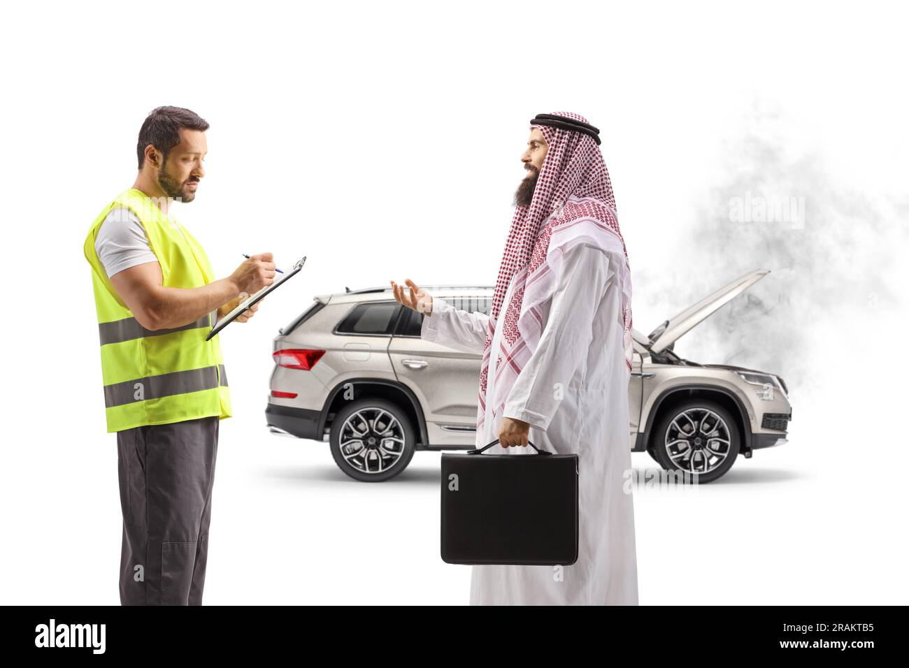 Saudi arab man with a car problem talking to a roadside assistant ...