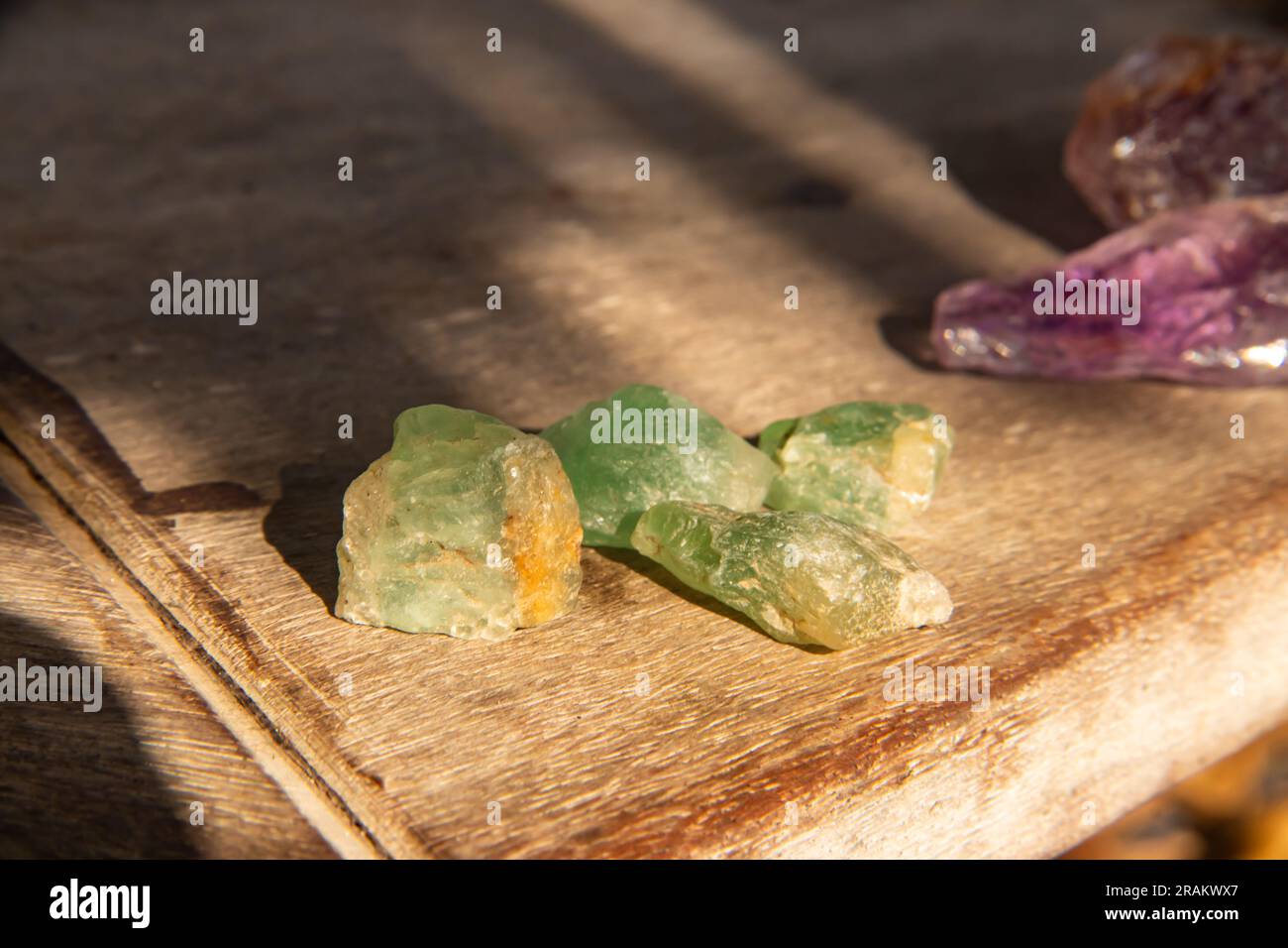 Semi precious gemstones in green and purple colors, mined in illegal ...