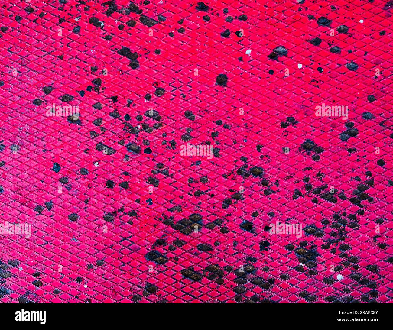 Neon red steel plate with non slip texture and rust marks Stock Photo ...