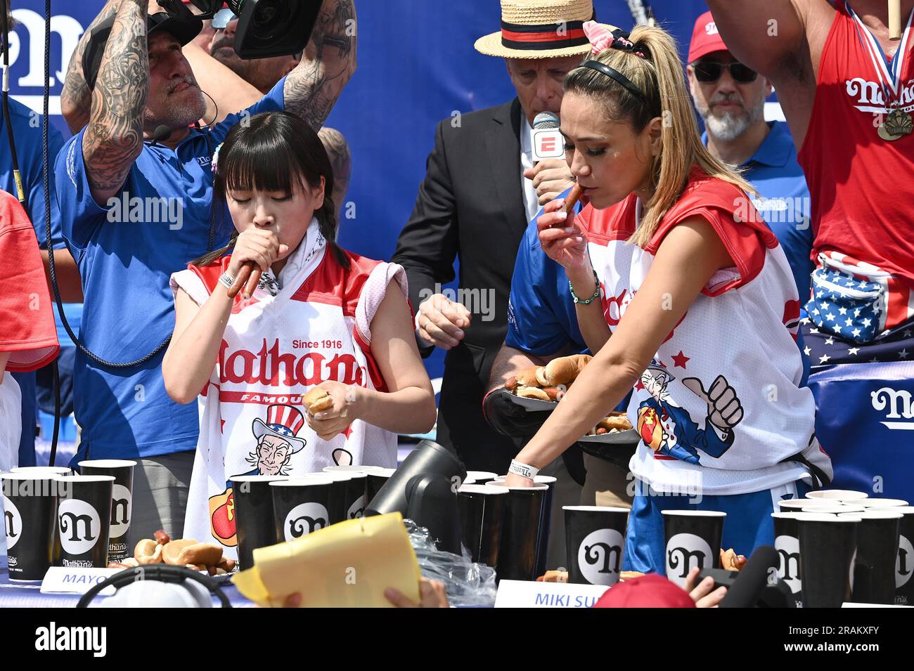 New York, USA. 04th July, 2023. Competitive eaters Mayoi Ebihara (l ...