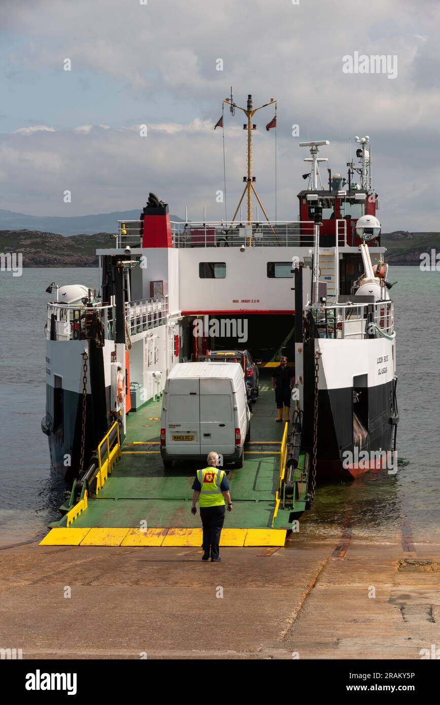 Isle of Iona, Mull, Scotland, UK. Vehicles loading MV Loch Buie via a ...