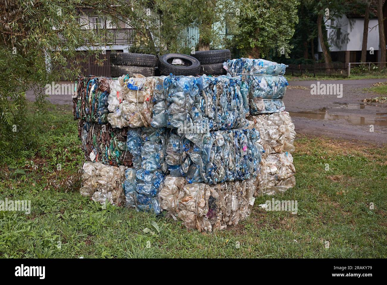 Plastic bottles in bales for waste recycling Stock Photo - Alamy
