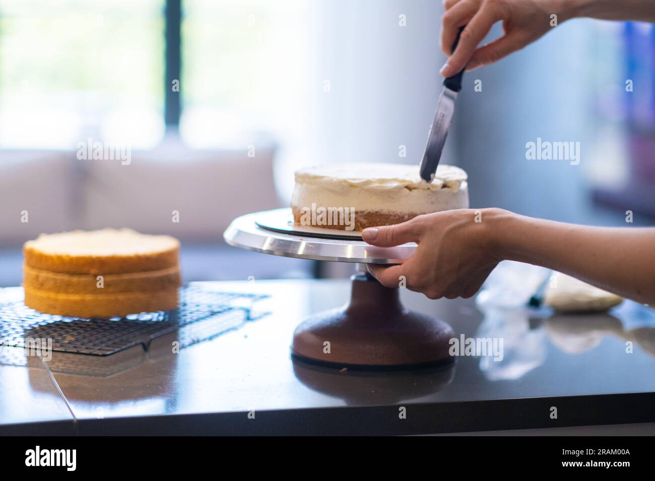 Skilled confectioner making handmade dietary sweets for birthday ...