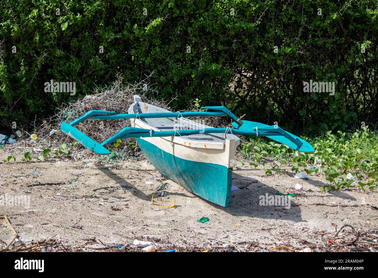 Typical wooden simple African villagers boat for fishing, made of local ...