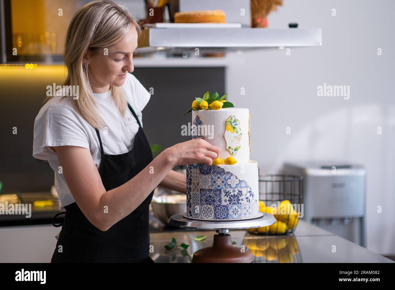 Focused blonde woman putting confit hi-res stock photography and images ...