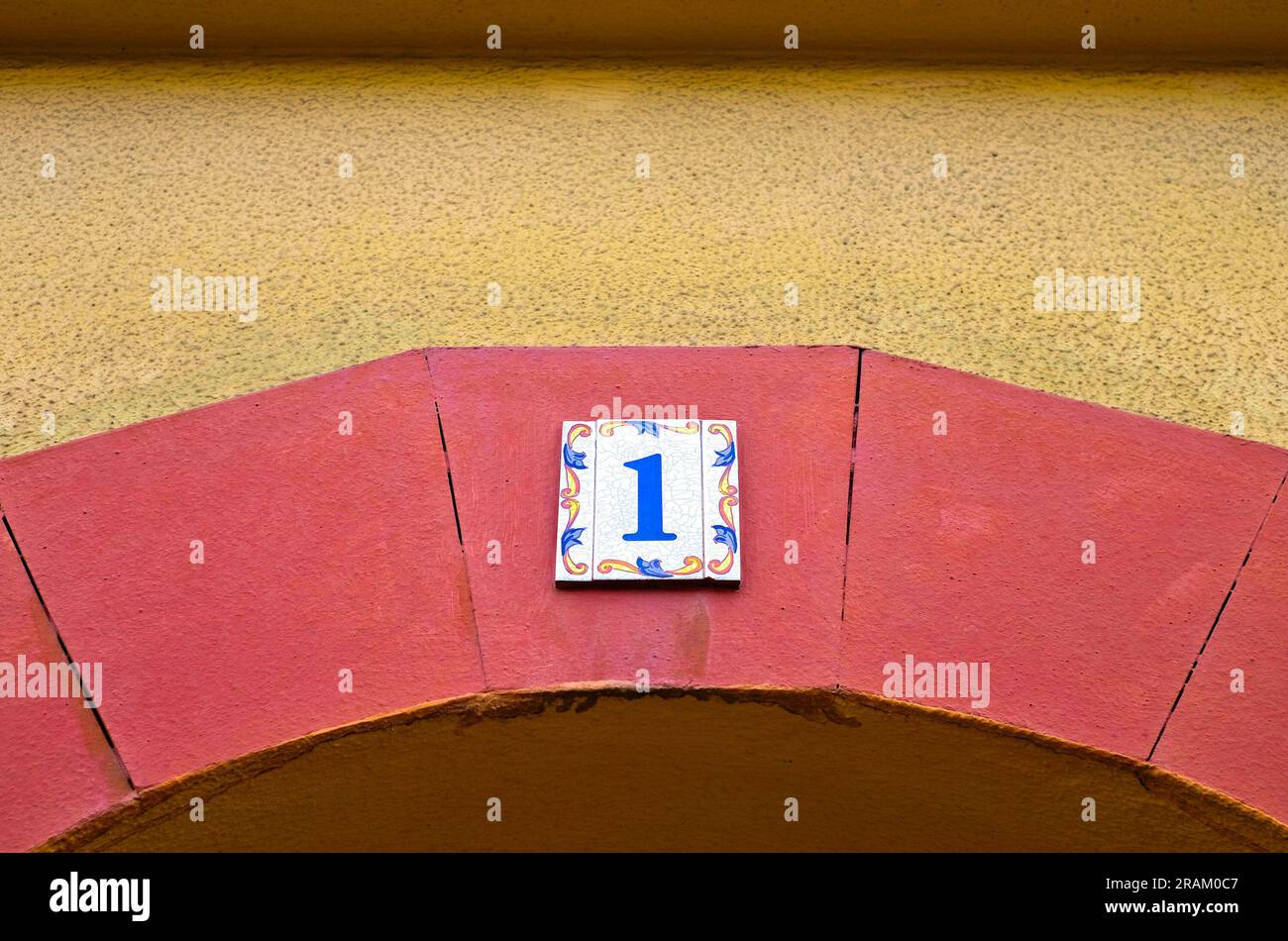 Home number 1 decorative numeral tiles on house entrance Stock Photo ...