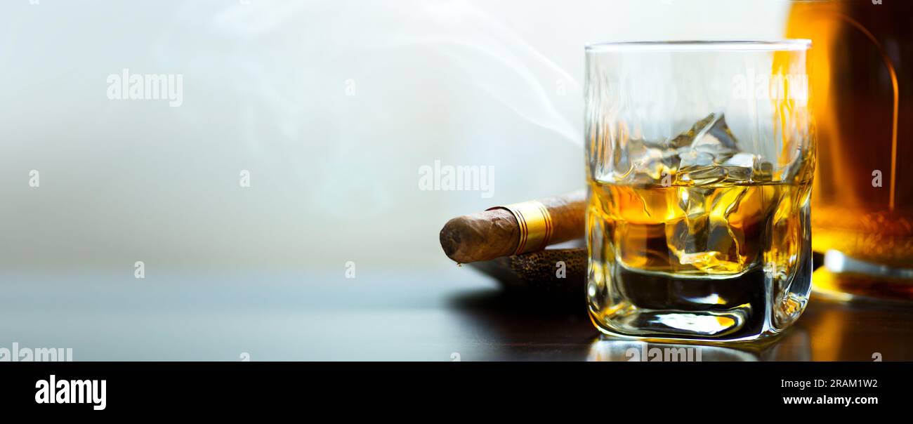 whiskey glass, cigar and bottle; luxurious men's club banner background ...