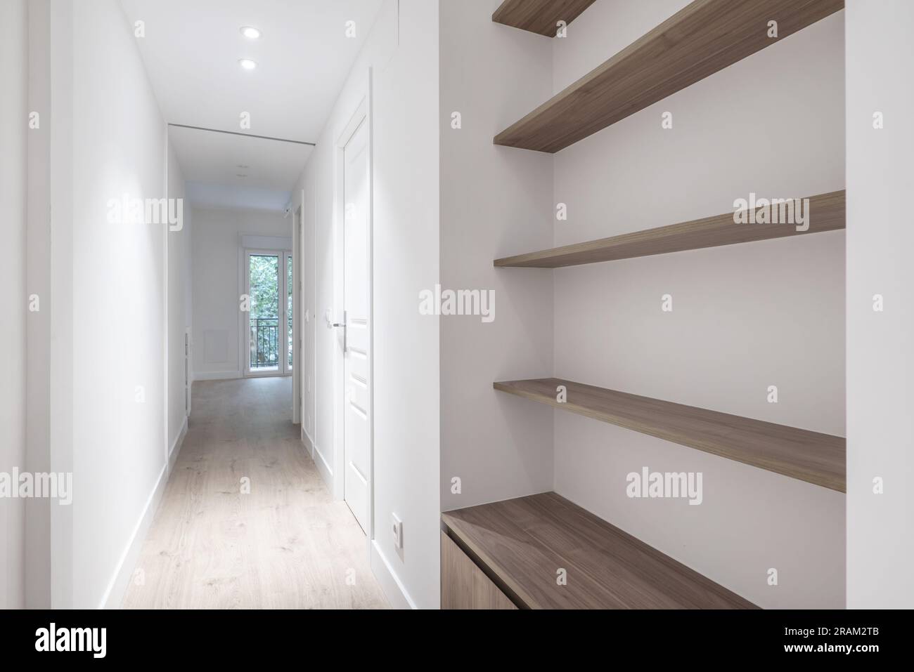 A distribution corridor of a house with access to other rooms and ...