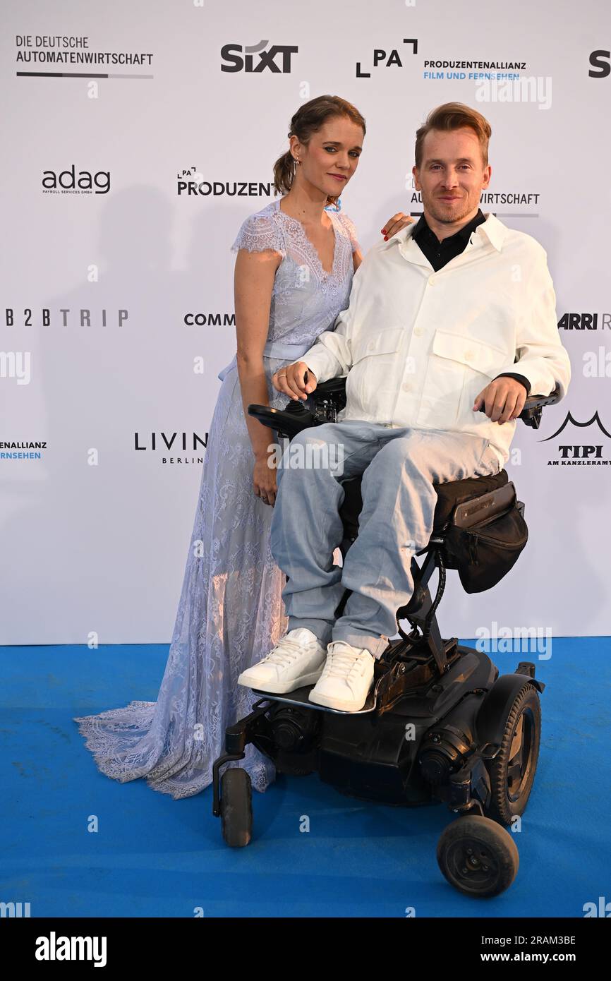 Berlin, Germany. 04th July, 2023. Samuel Koch and his wife Sarah Elena ...