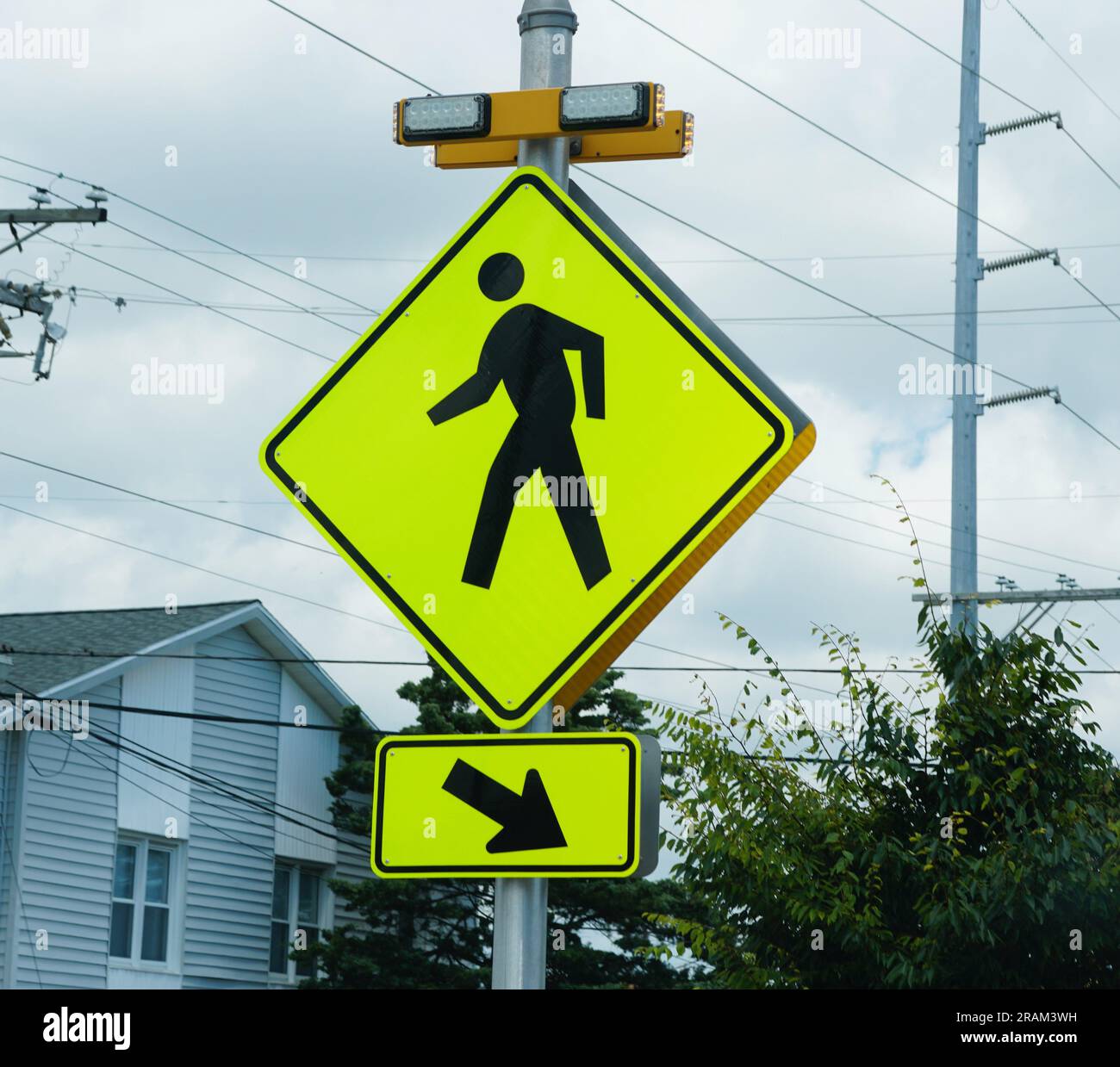 Dewey Beach, Delaware, U.S - July 4, 2023 - A yellow crossing line and blinking lights on the ...