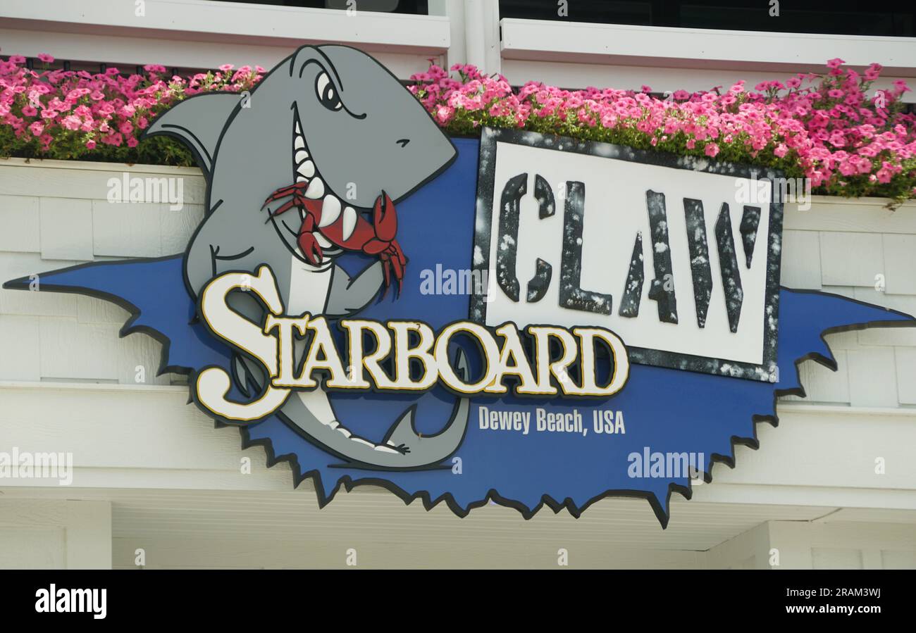 Dewey Beach, Delaware, U.S.A - July 4, 2023 - The famous Starboard Claw restaurant and bar sign ...