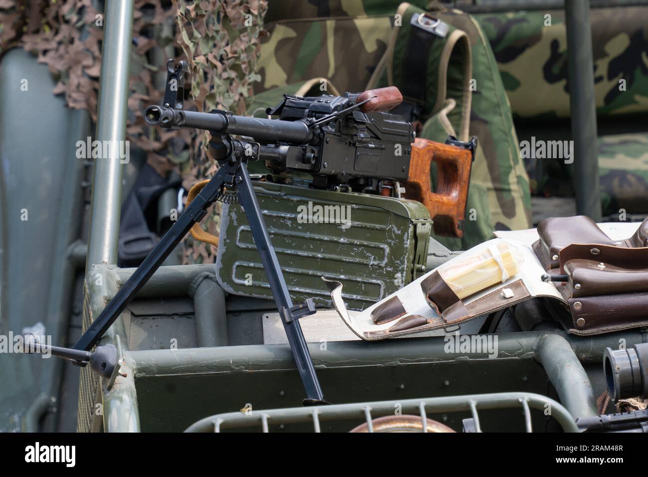 Soviet-made PK machine gun and camouflage netting.. "Kalashnikov's ...