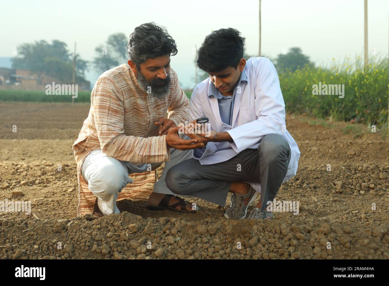 Doctor testing the soil for the betterment of the agricultural benefits ...