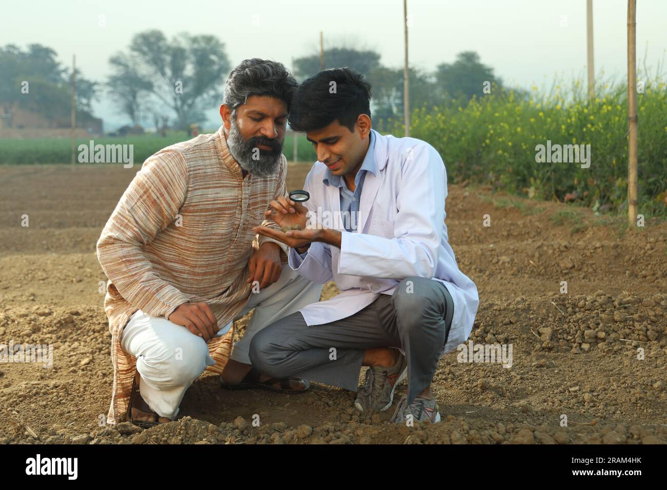 Doctor testing the soil for the betterment of the agricultural benefits ...