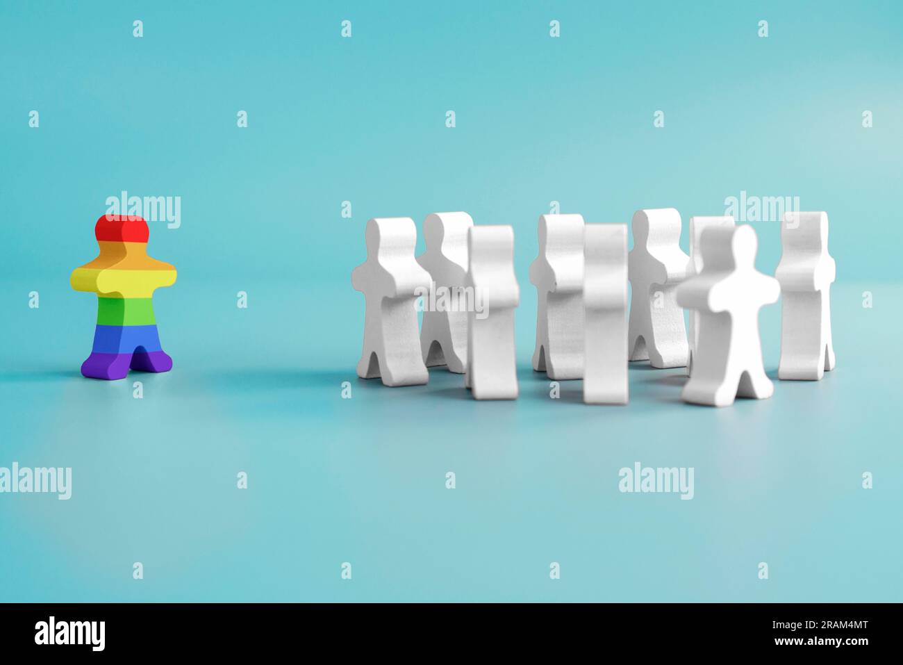 A lot of white figurines and one colored figurine as symbol of ...