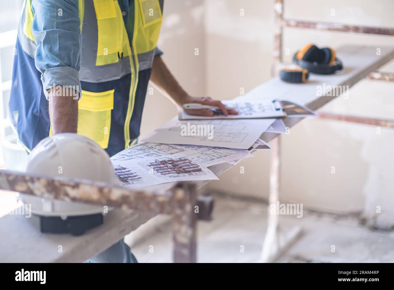 Construction manager architect checking hi-res stock photography and ...