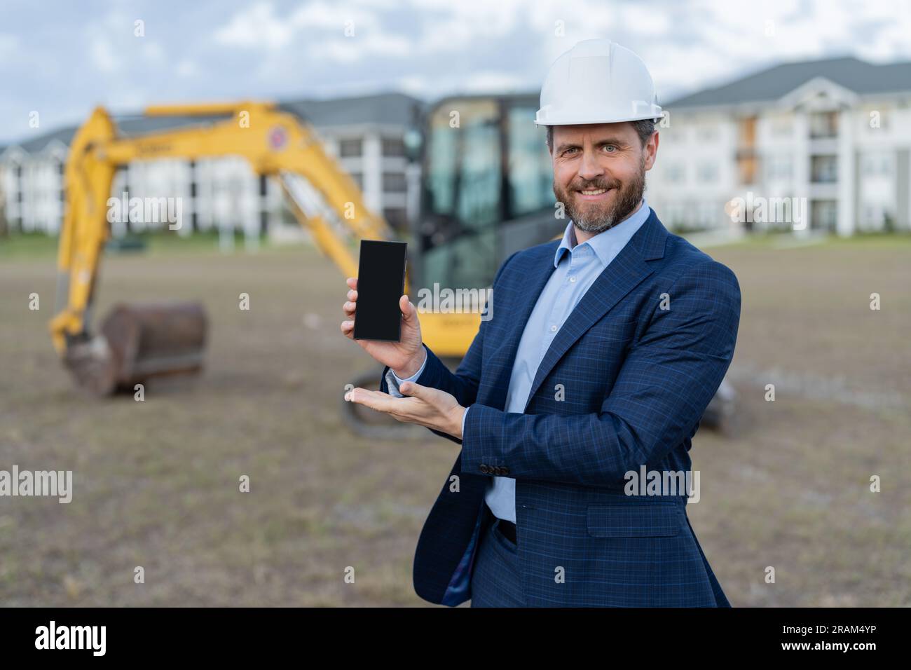 photo with inspector of construction engineering at site presenting ...
