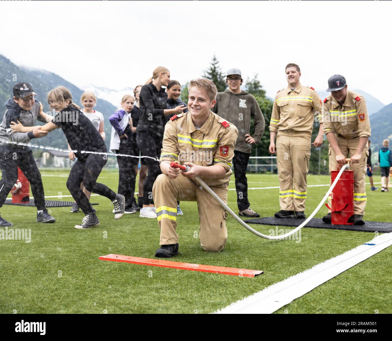AUSTRIA, BAD HOFGASTEIN - July 1, 2023: Uniformed firefighters teach ...