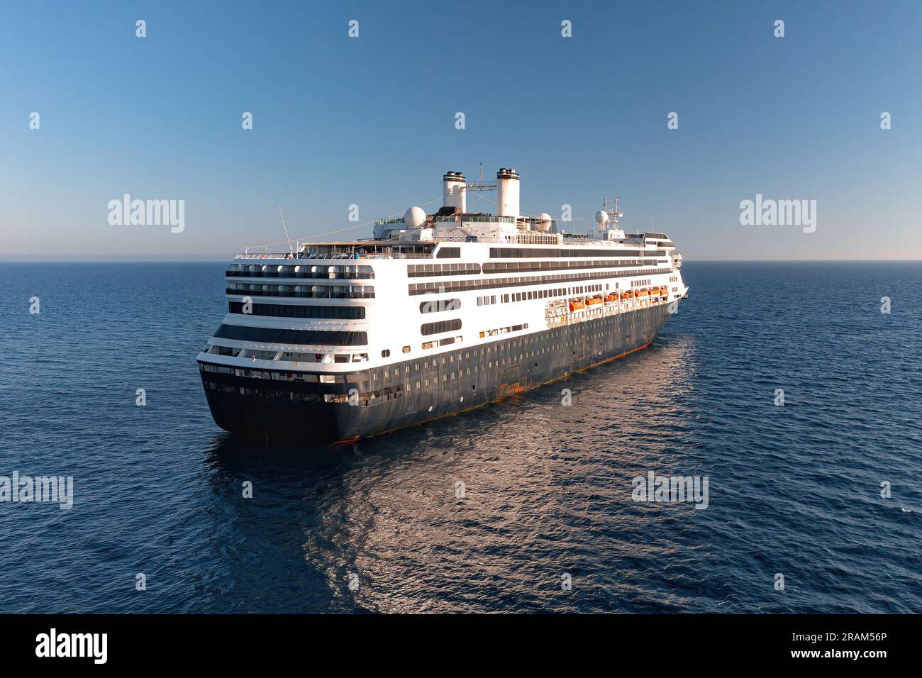 Rear end of the sailing cruise ship in open sea Stock Photo - Alamy