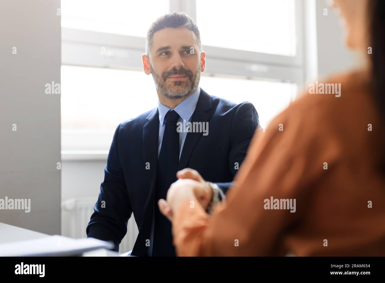 Partnership concept. Man entrepreneur giving hand for handshake to ...