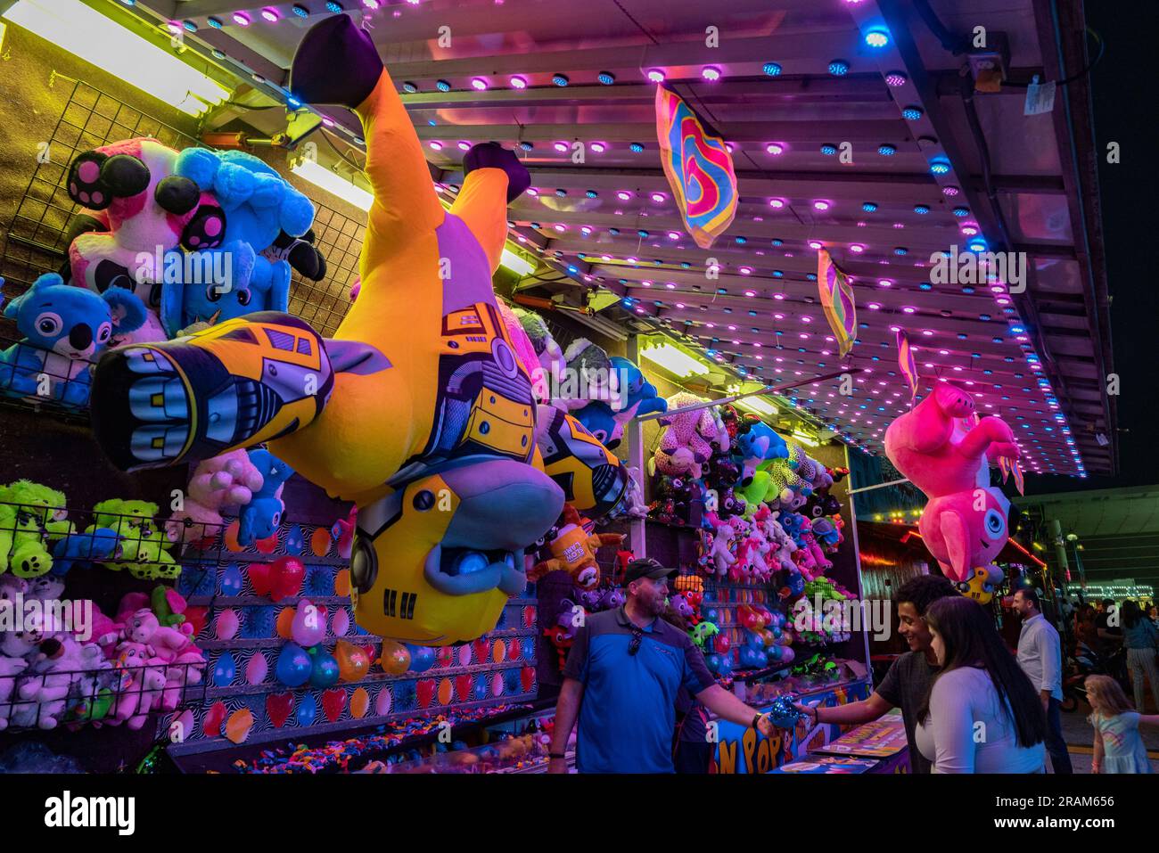 Colorful attraction at the fairground during summer time Stock Photo ...