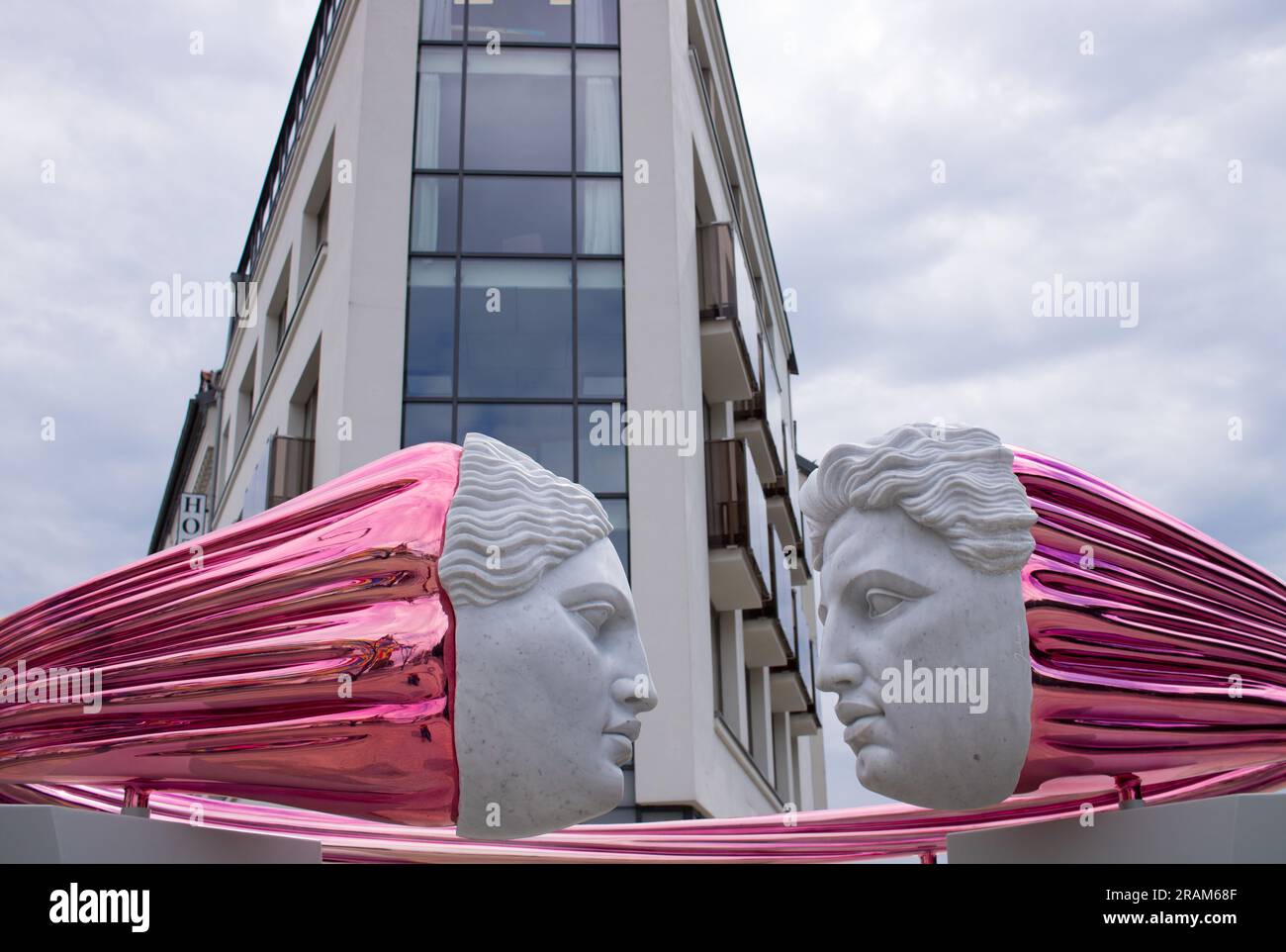 Two faces sculpture in the city center 5.07.2023 Bialystok Poland ...