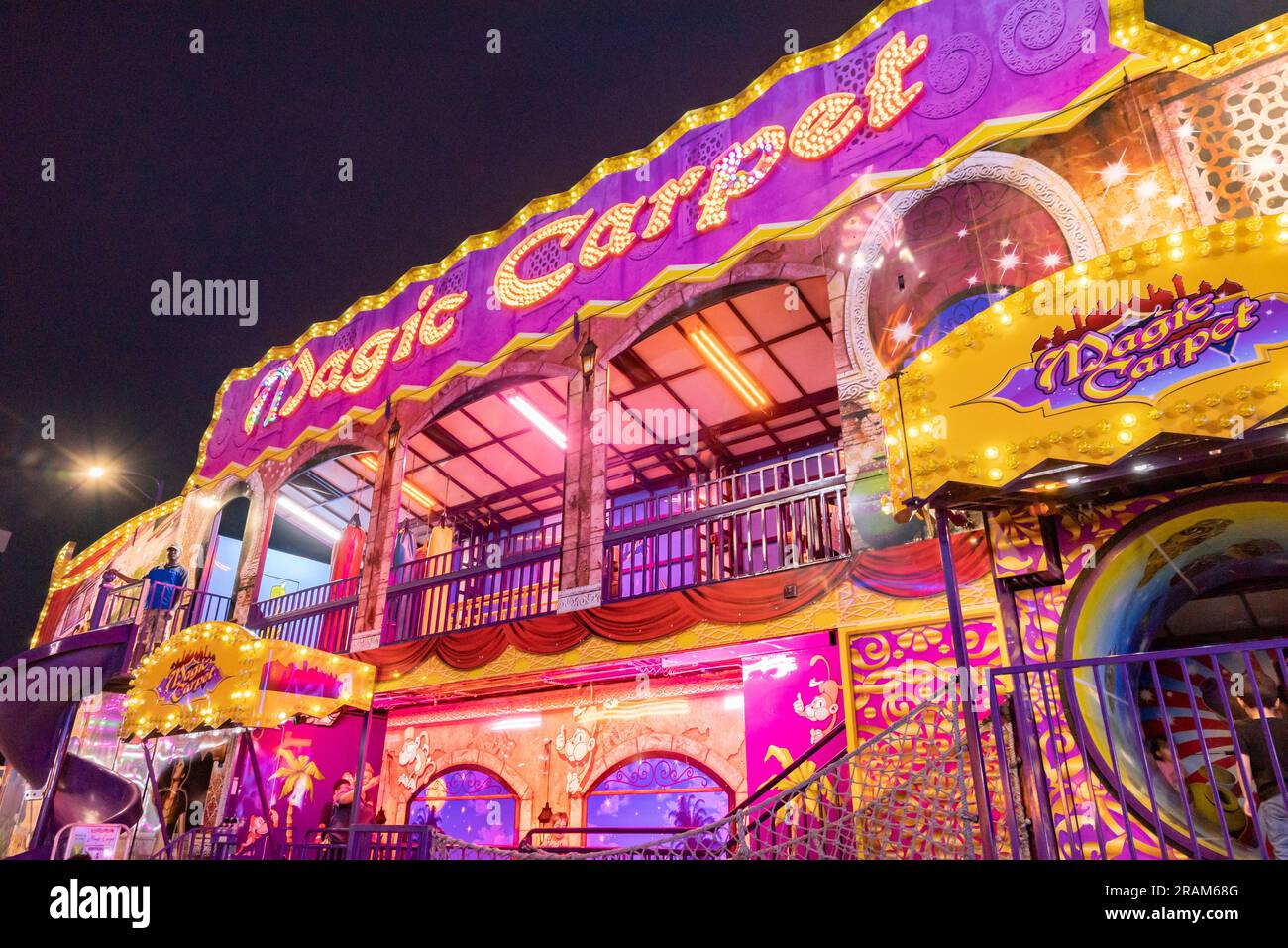Colorful attraction at the fairground during summer time Stock Photo ...