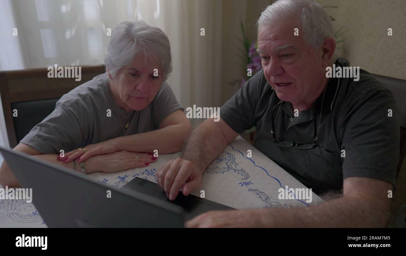 Senior Couple Engaging in Long-Distance Communication Via Video ...