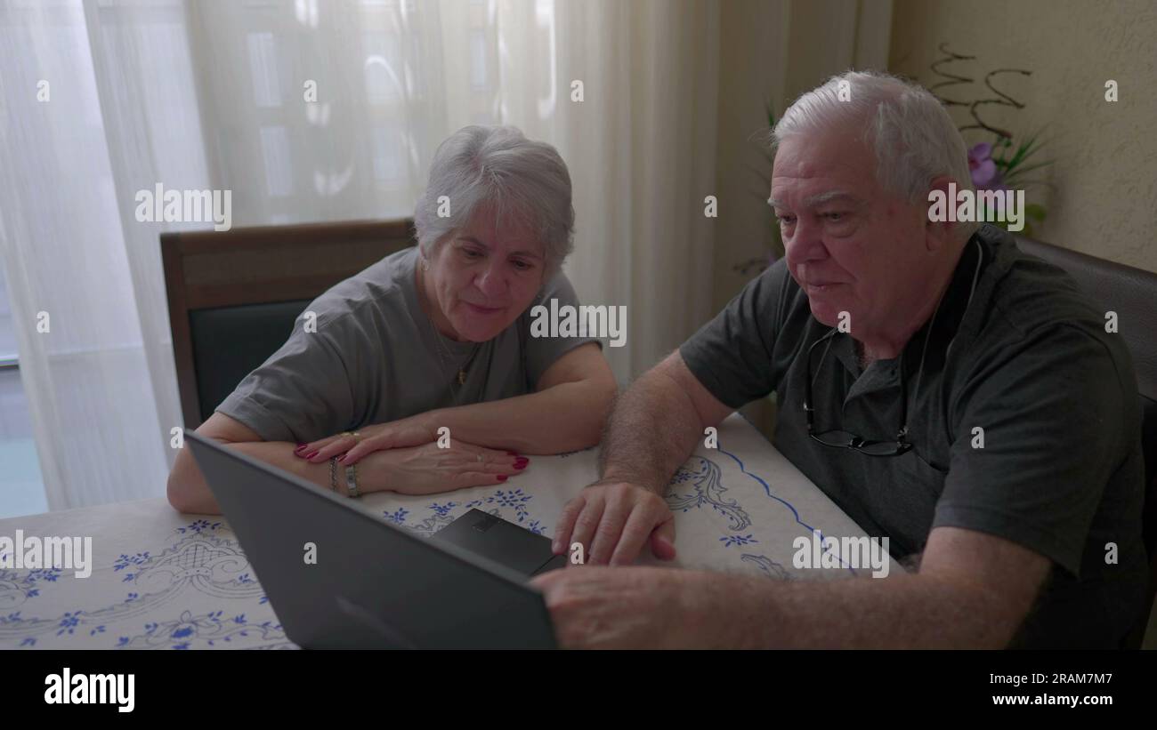 Senior Couple Engaging in Long-Distance Communication Via Video ...