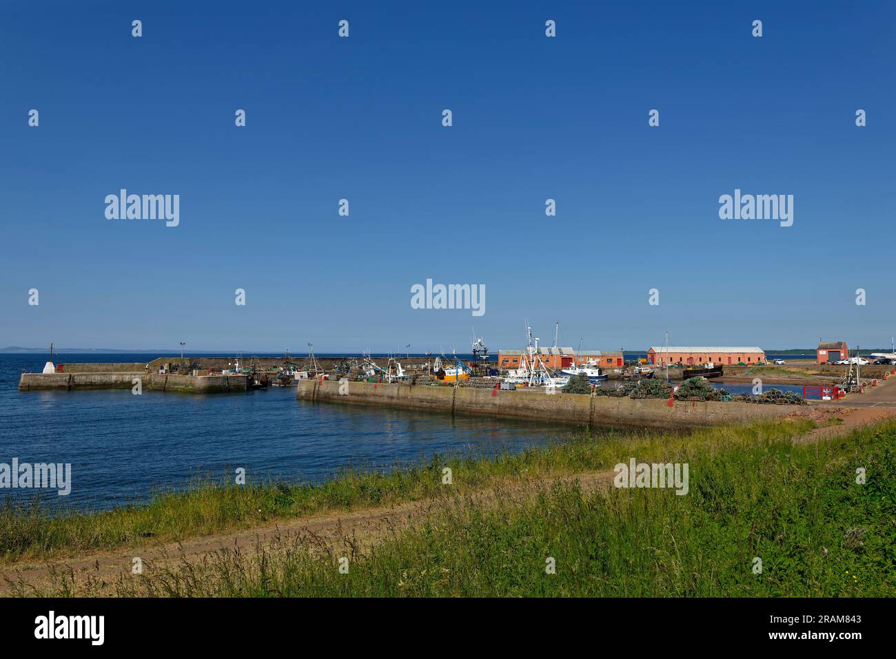 The small Fishing harbour of Port Seton on the Firth of Forth, with its ...
