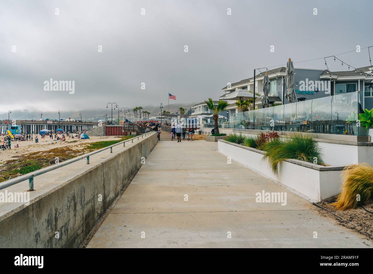 Pismo Beach, California, USA - July 2, 2023. Pismo Promenade at sunset ...
