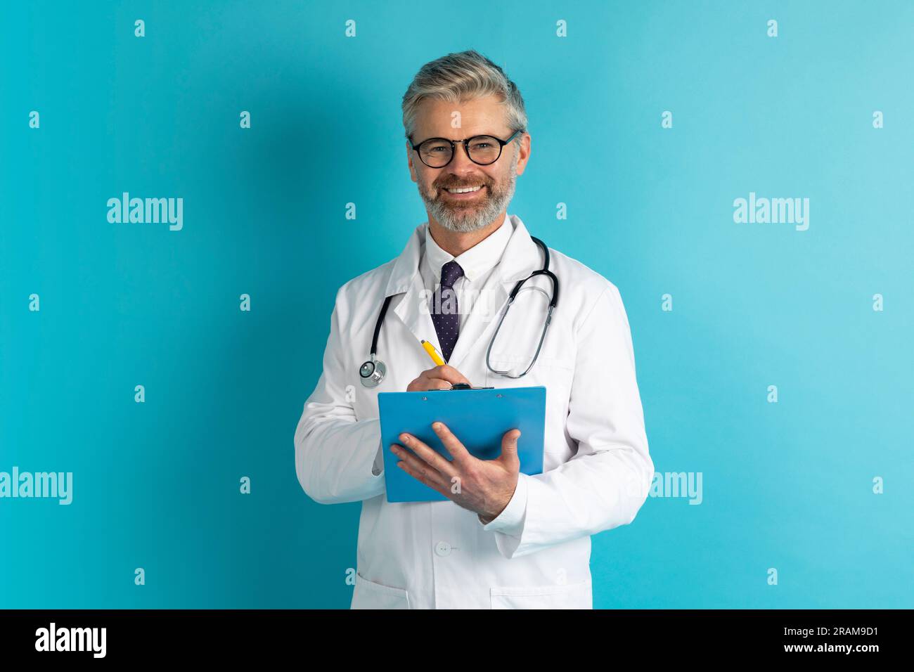 Happy middle aged doctor taking hi-res stock photography and images - Alamy