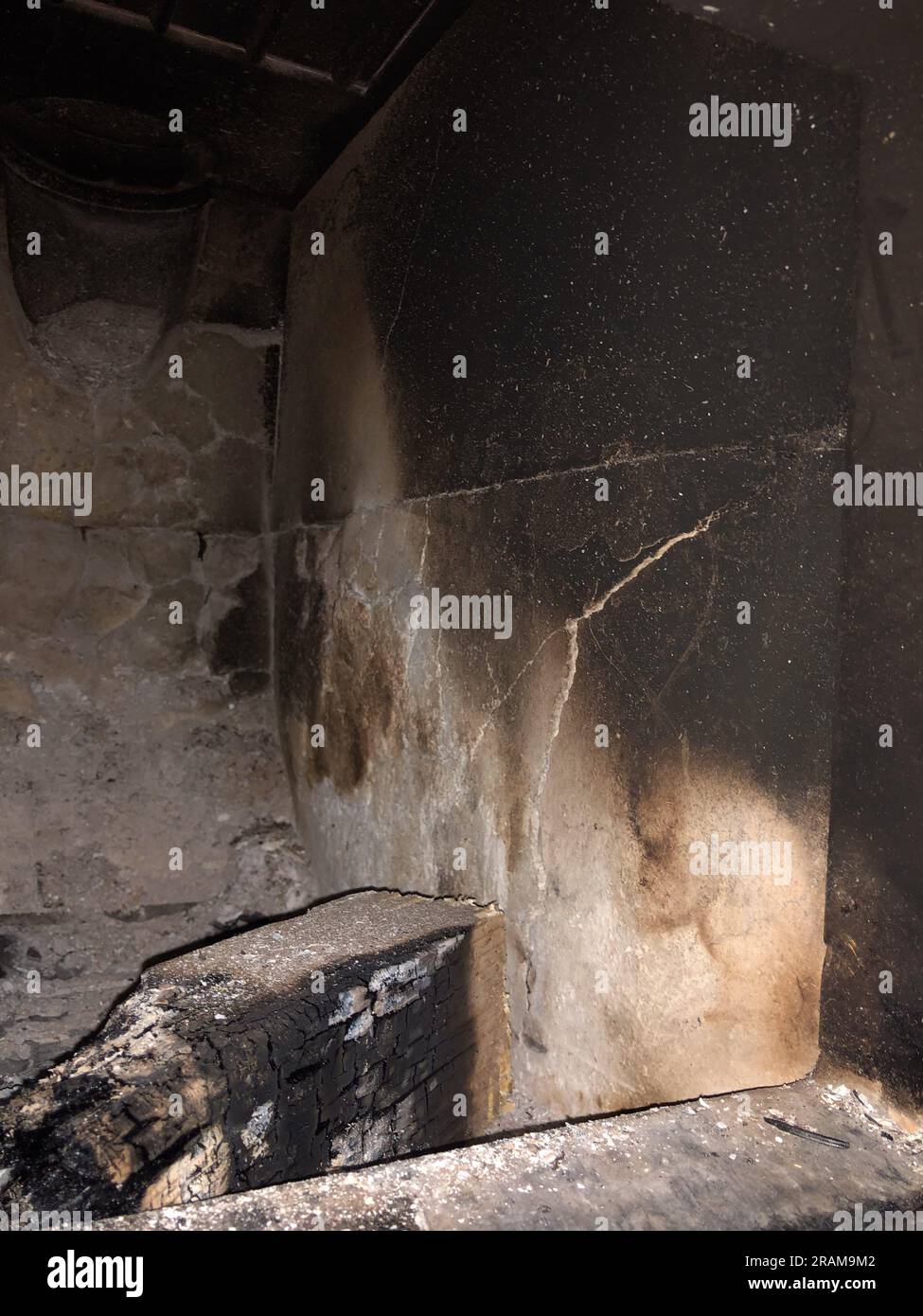 Broken firebrick in a tiled stove Stock Photo - Alamy