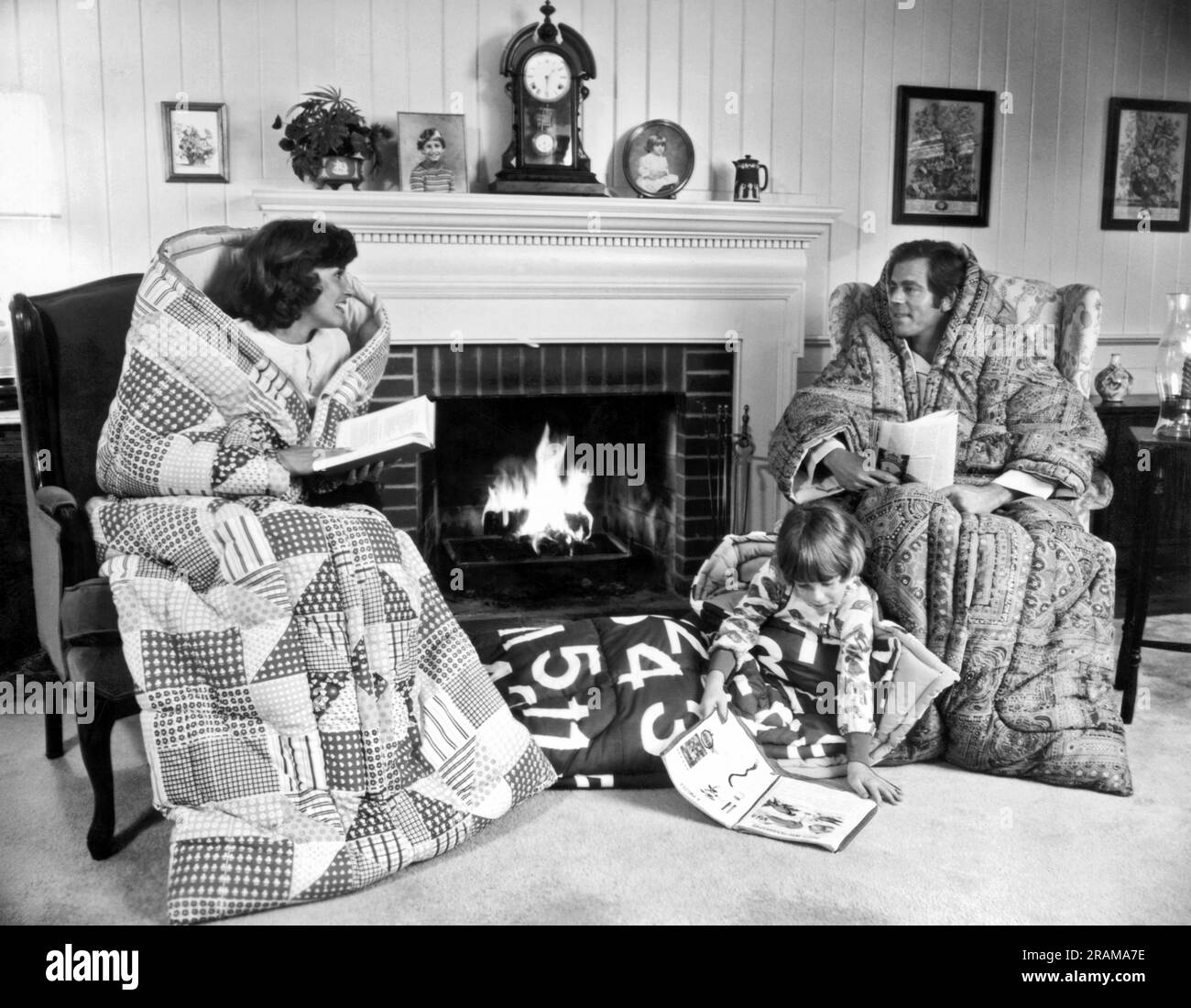Detroit, Michigan: October 15, 1977. A family cozies up for the ...