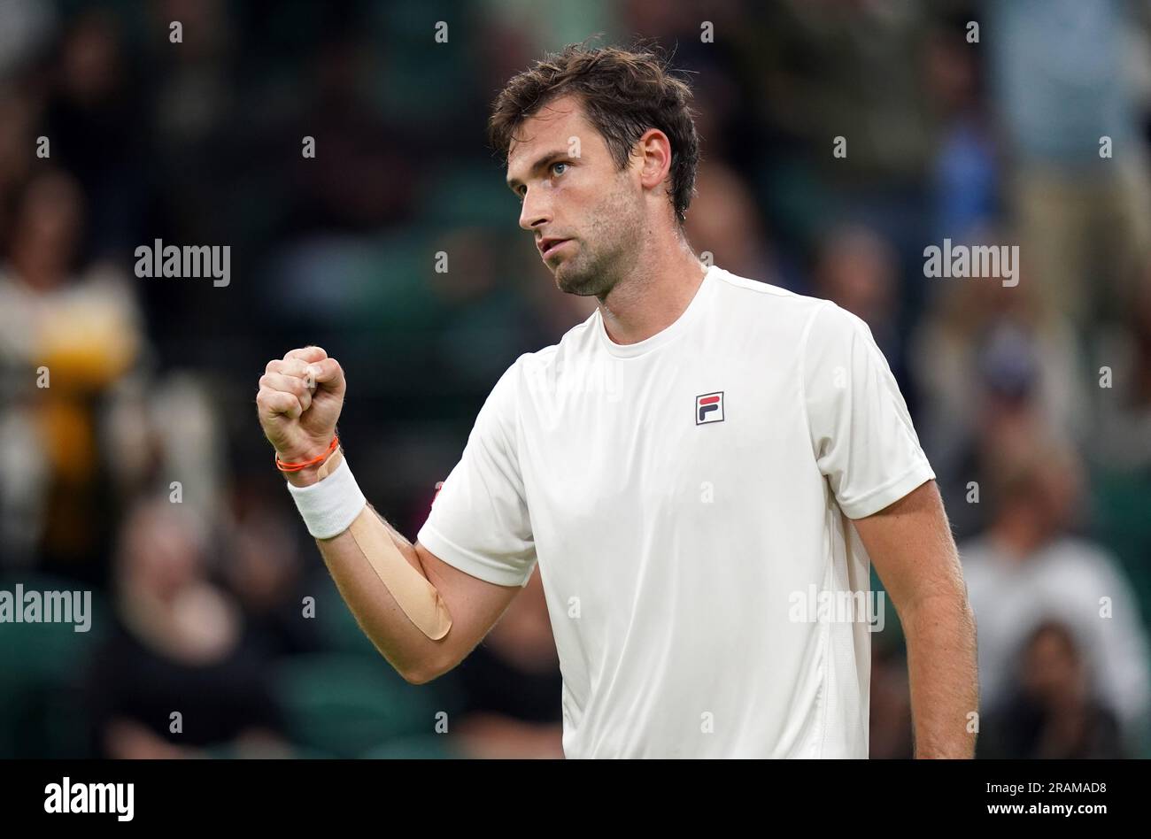 Quentin Halys celebrates victory over Daniel Evans (not pictured) on ...