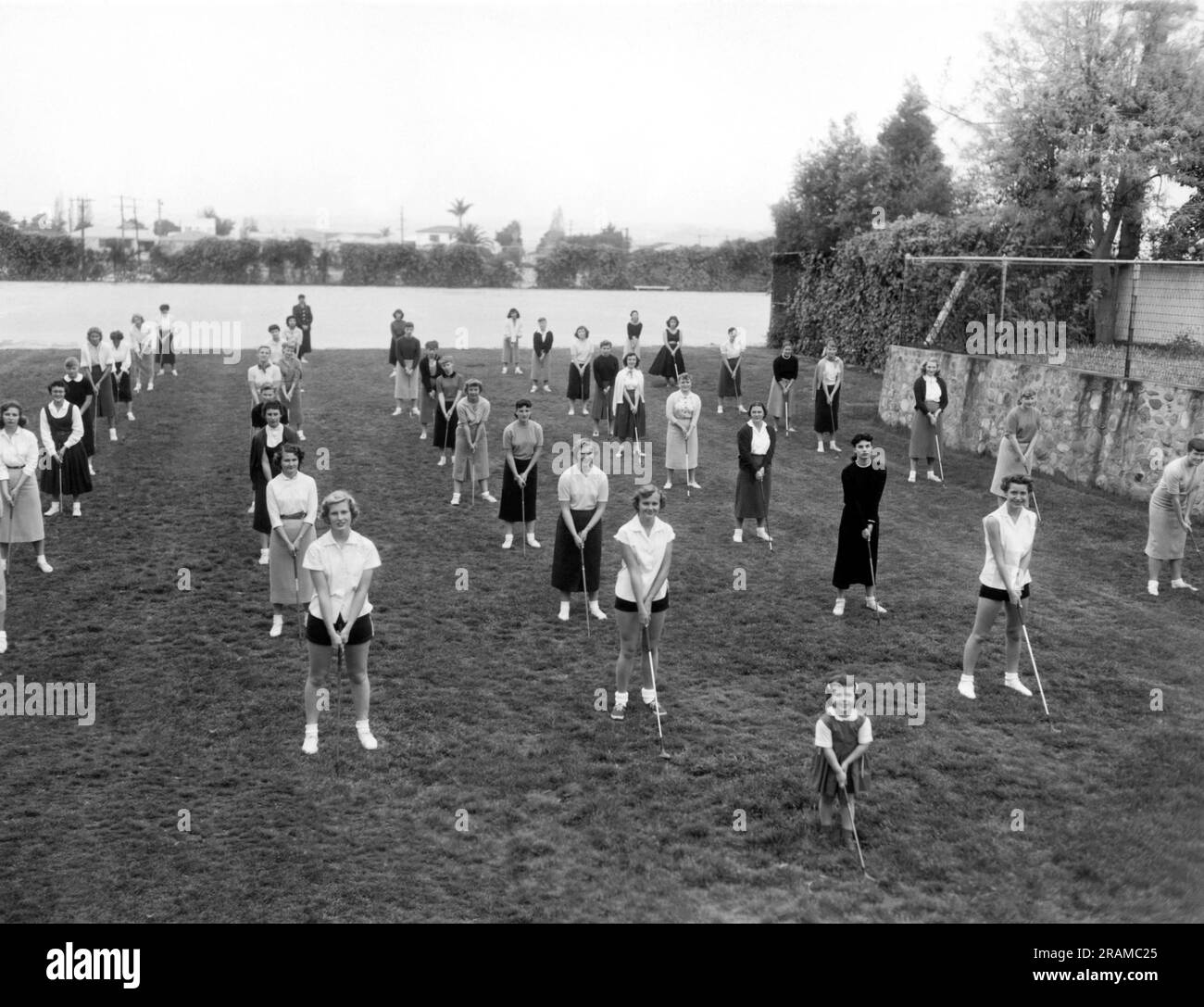 United States: c. 1954. A large group of women and one small girl ...
