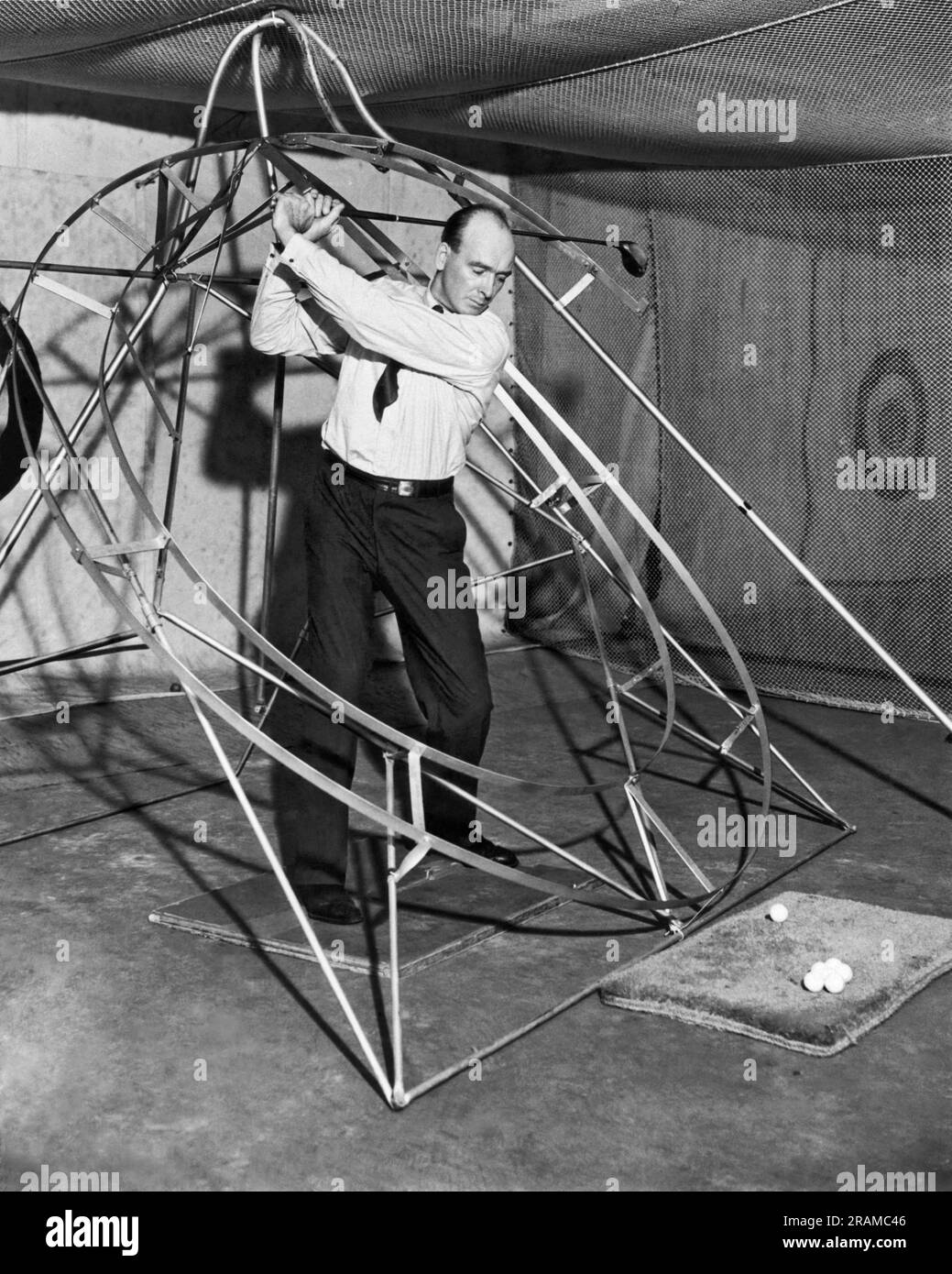 Chicago, Illinois: c. 1931. Bob McDonald's perfect swing device. The ...