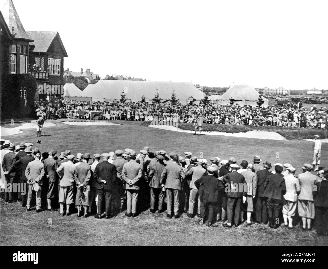 St. Andrews, Scotland: c. 1920. Spectators crowding to watch the play ...