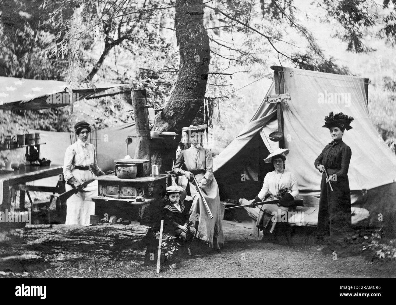 United States: c. 1890 Four Victorian women all armed with rifles pose ... United States: c. 1890 Four Victorian women all armed with rifles pose ...