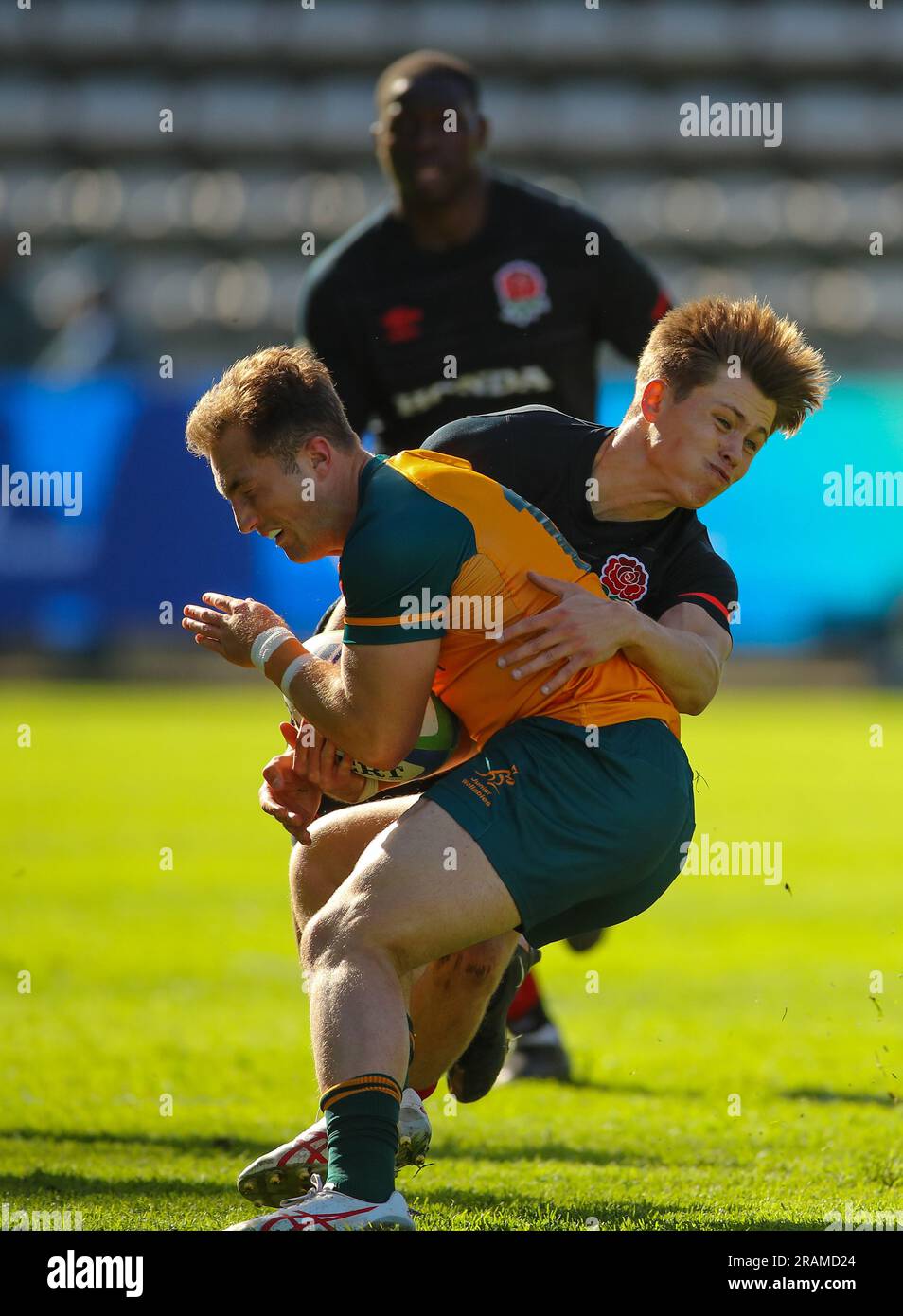 Cape Town, SOUTH AFRICA - Tuesday 04 July 2023, Charlie Bracken of England tackles Jack Bowen of ...