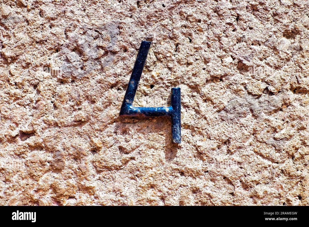 4, number four, black digit on a stone surface Stock Photo - Alamy