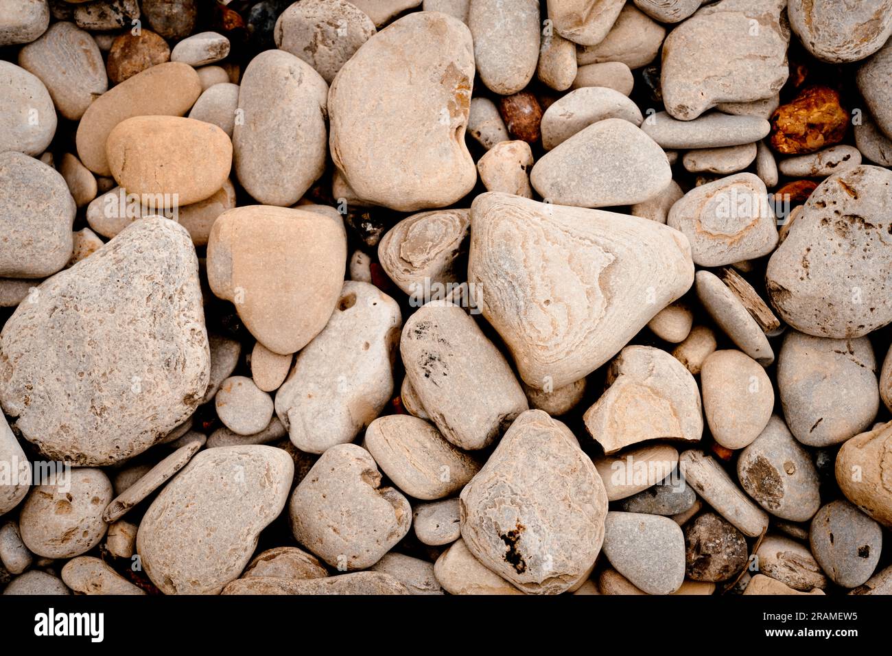 Close up of pebbles on the beach at Marsden Bay in South Shields, Tyne ...