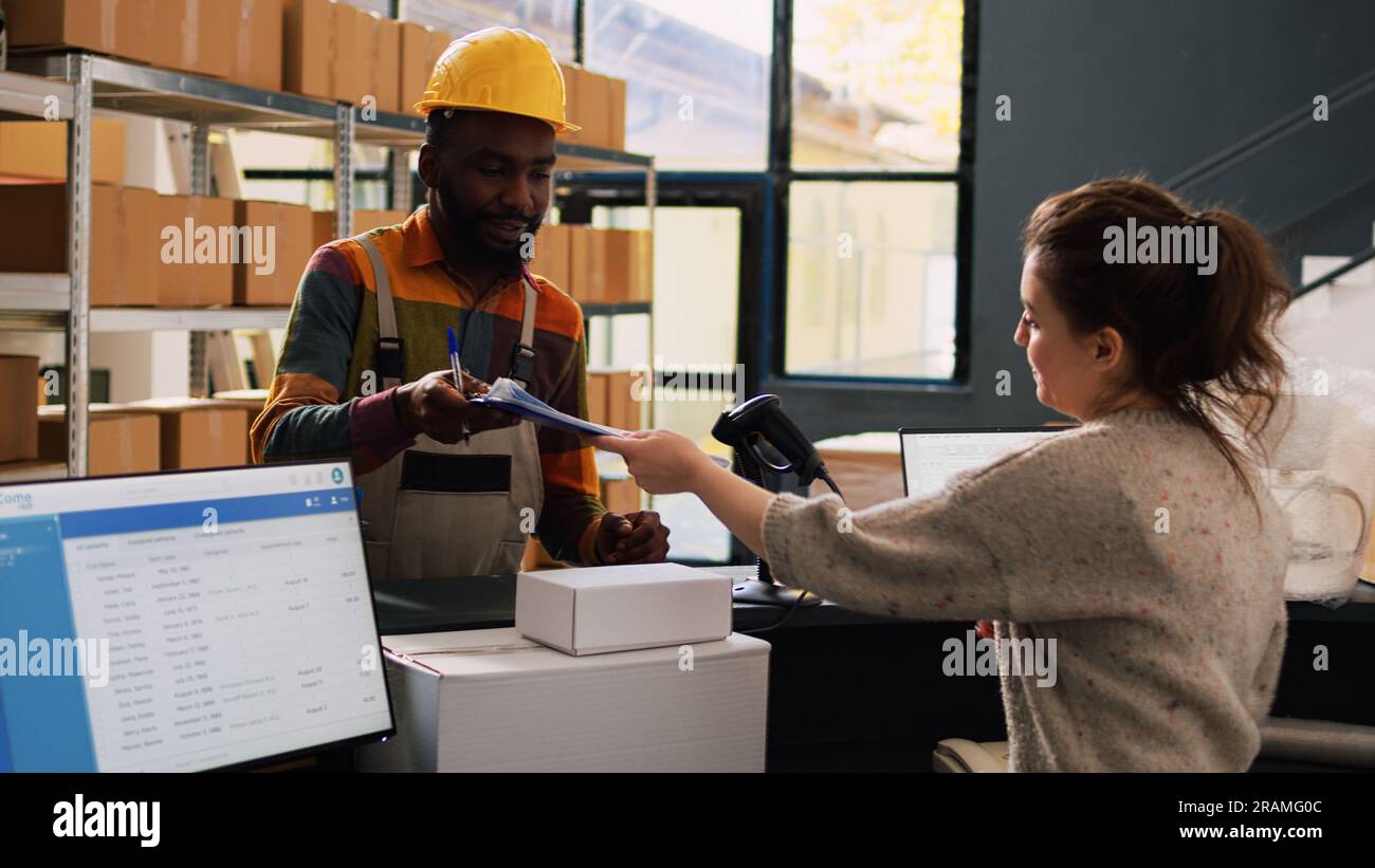 Diverse people checking inventory stock hi-res stock photography and ...
