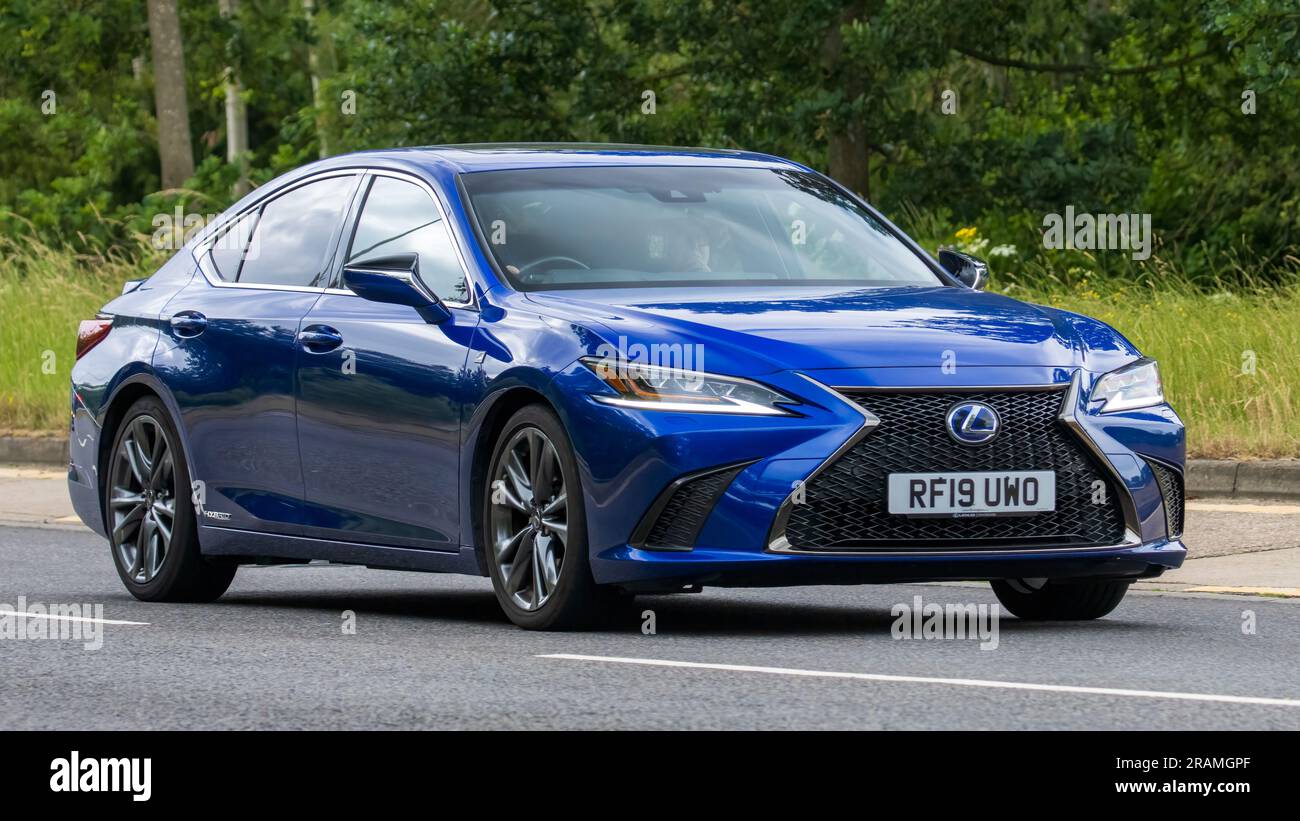 Milton Keynes,UK - July 2nd 2023. 2019 LEXUS ES 300H F SPORT CVT hybrid electric car travelling ...