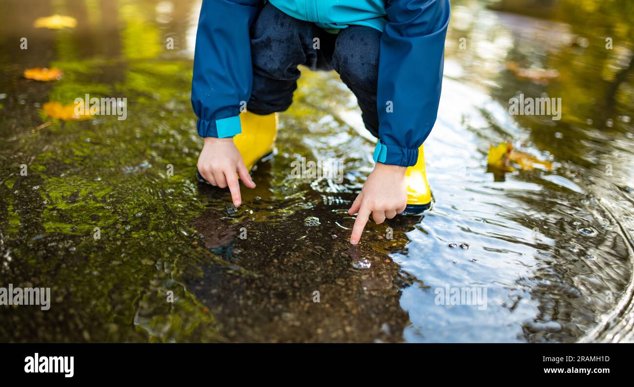 Child mud puddle reflection hi-res stock photography and images - Alamy