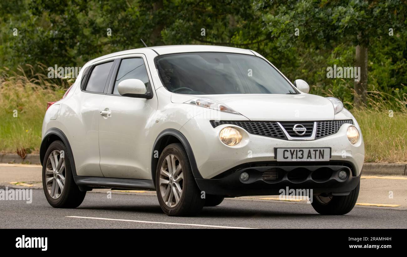 Milton Keynes,UK - July 2nd 2023. 2013 white diesel engine NISSAN JUKE ...