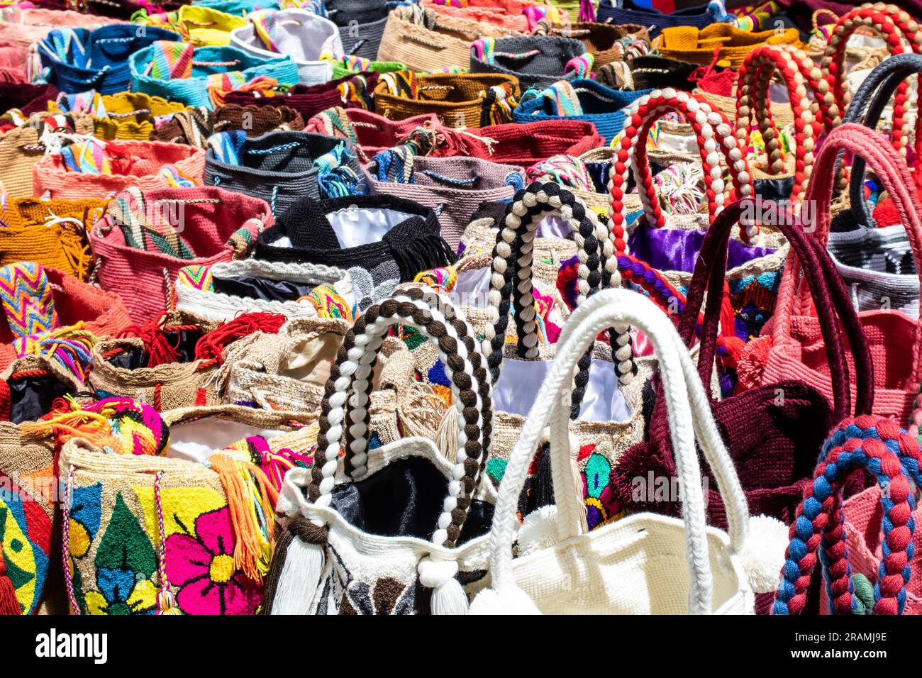 Street selling in Bogota of traditional bags hand knitted by women of ...