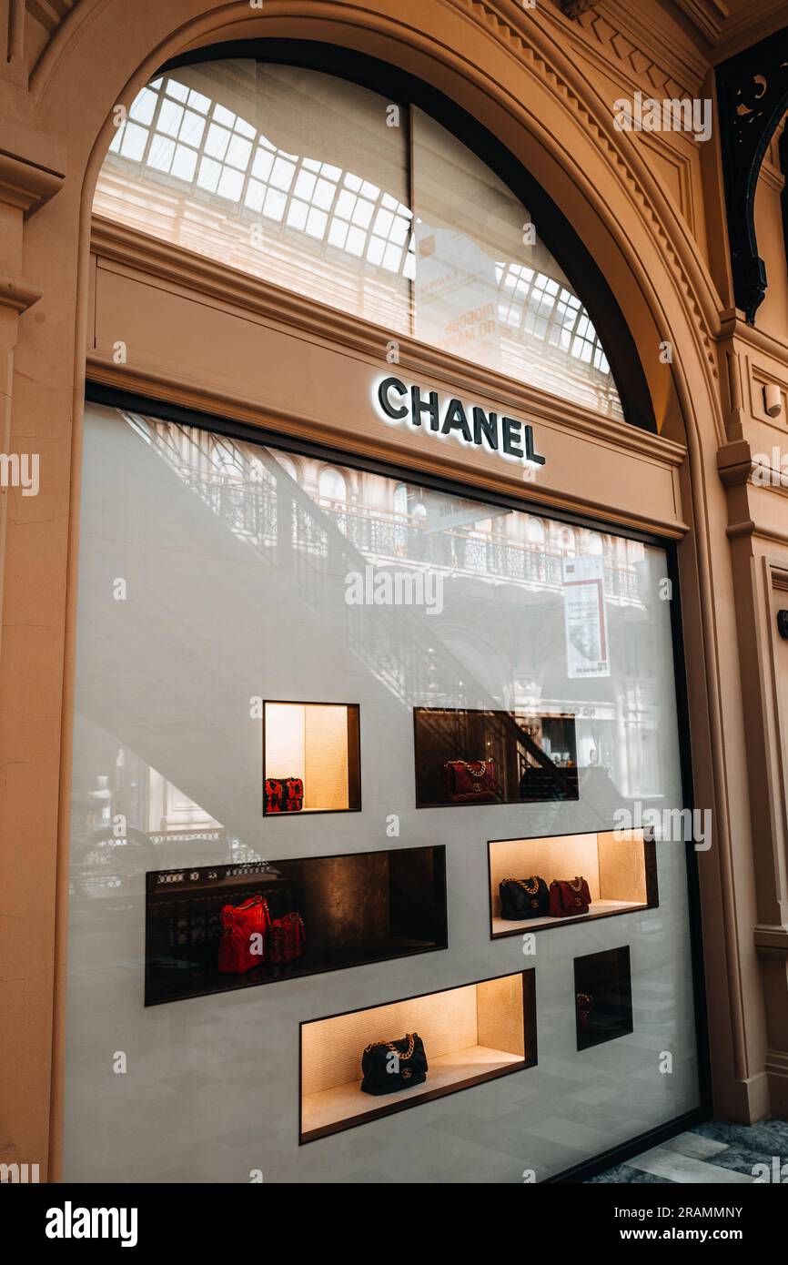Classy beige Chanel boutique shop window Stand with handbags in the ...